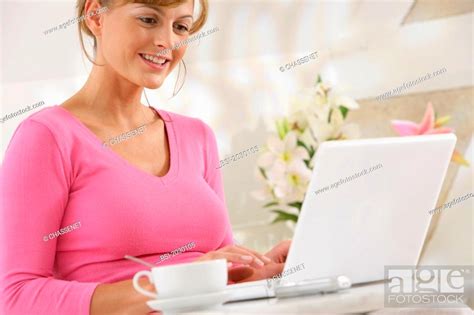 WOMAN AT A COMPUTER Model Stock Photo Picture And Rights Managed Image Pic BSI 2030105