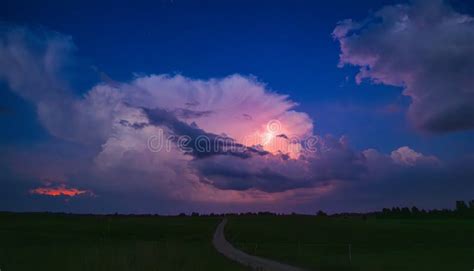 Thunderstorm At Night With Milky Way Moving Across The Sky Stock Image