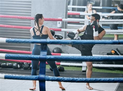 Fit Healthy And Active Woman Doing Kick Boxing Workout In The Gym