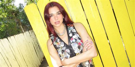 Dua Lipa Adds A Preppy Touch To Her Leather Hot Pants