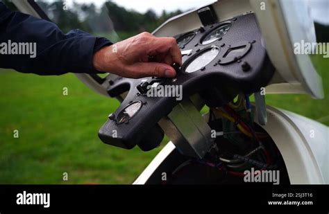 Test Of The Control Unit In The Cockpit Of A Small White Airplane Stock