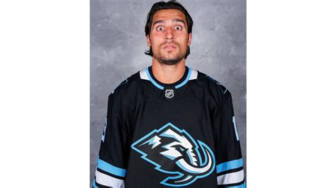 Tanev Looks Like He Got Mammoth Sized Surprise In Utah Team Photo