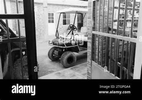 Golf Cart Buggy Cars Carts Taxi On Muddy Sandy Street Road In The Village And At The Beach On