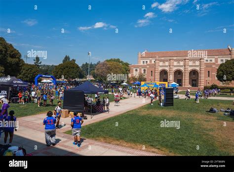 Lively Outdoor Event On Ucla Campus With Royce Hall In Background Stock