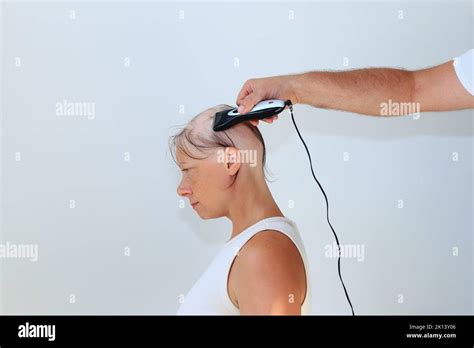 Consequences Of Chemotherapy Shaving Off The Last Hair On The Head