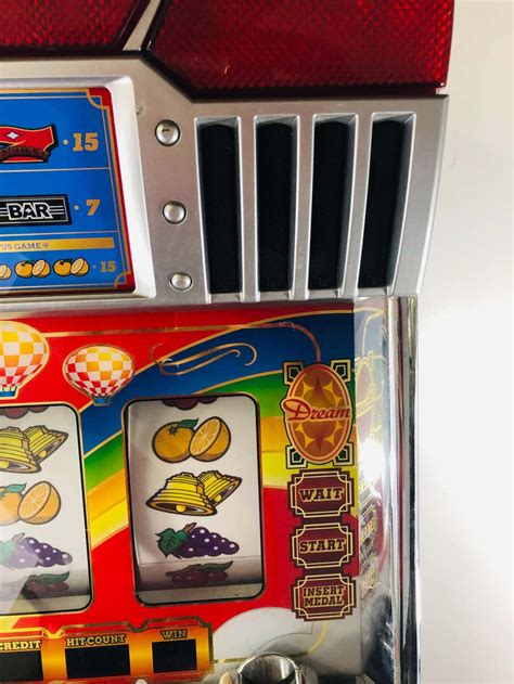 Vintage Japanese Slot Machine With Tokens