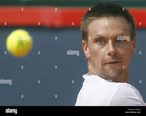 Swedish Robin Soederling Is Shown In Action During The Last Sixteen Round Against Swiss Federer
