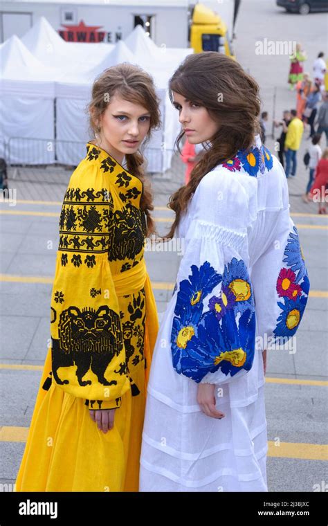 Young Girls In Ukrainian National Embroidered Dresses Standing On The