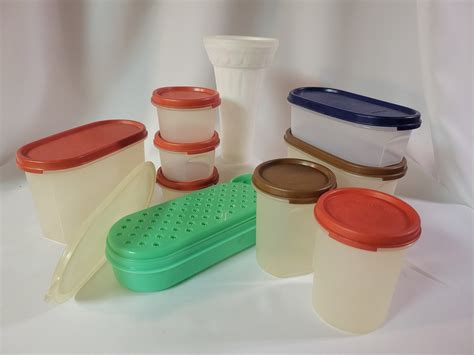 Large Lot Of Tupperware Different Sizes All With Lids Flower Vase