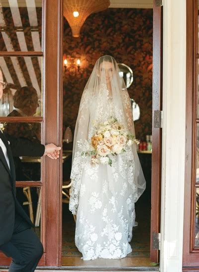 Brides Entrance With Lace Veil Over Face