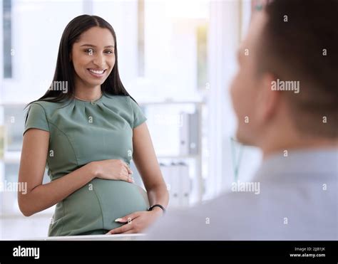 I Have A Few More Months To Go A Young Pregnant Businesswoman Sitting