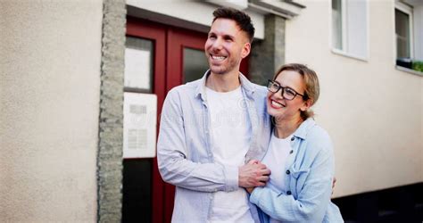 smiling couple buys new house together embarking stock image image