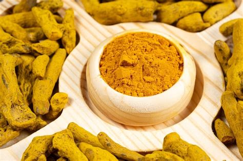 Premium Photo Turmeric Powder And Dried Turmeric Root Top View