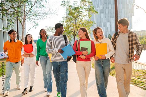 Big Group Of International Classmates Walking And Talking Together On
