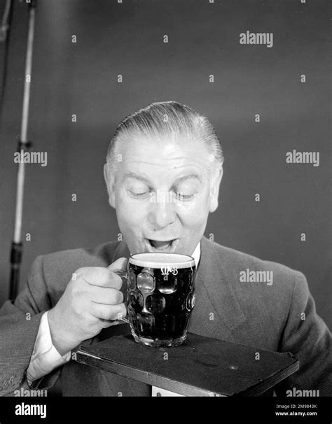 Advertisement For Mandb Mild Beer Male Model Vincent Charles Posing With A Pint Glass Stock