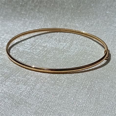 قیمت و خرید دستبند النگویی طلا 18 عیار زنانه گالری طلای ونوسام مدل آینه ای کد T1294s1