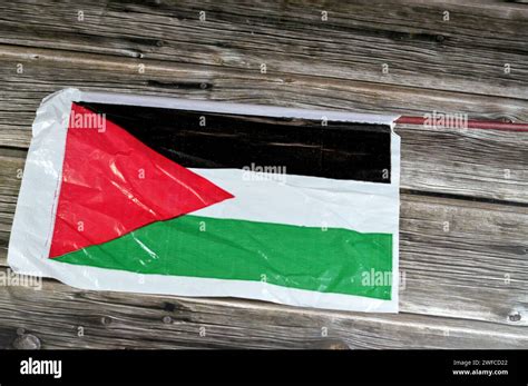The Flag Of Palestine A Tricolor Of Three Equal Horizontal Stripes