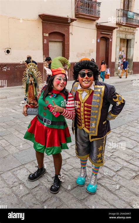 A Parade Of Clowns On The Macedonio Alcala Pedestrrian Street In The