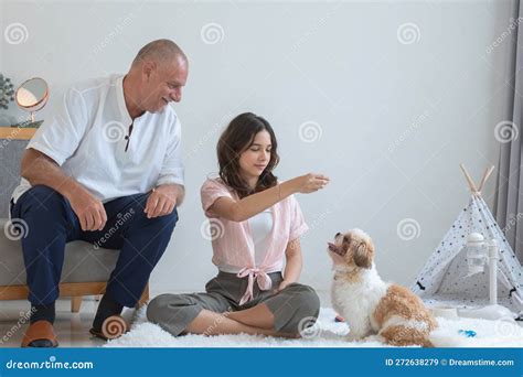 Kind Father Helping His Daughter Slicing Vegetables Royalty Free Stock