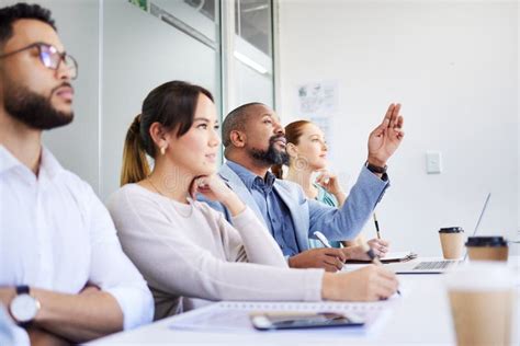 seminar black man business people and hand raised to ask questions