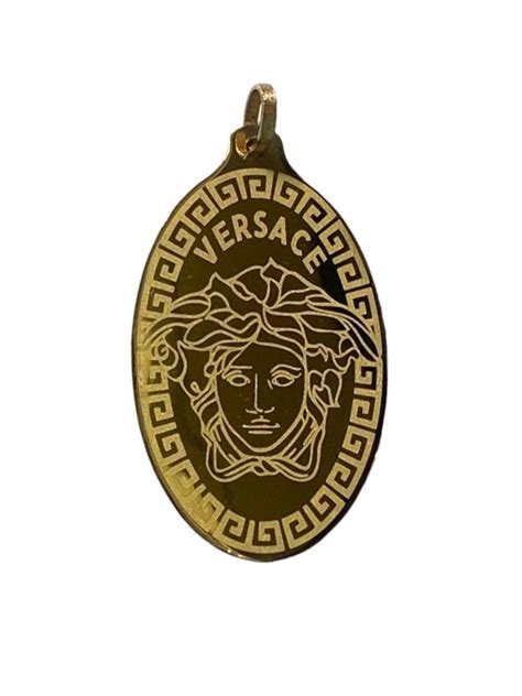 خرید و قیمت آویز طلا 18 عیار کوکوطلا مدل ورساچ