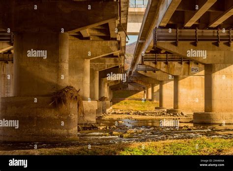 Underside View Of Columns Of Two Highway Overpass Next To Each Other