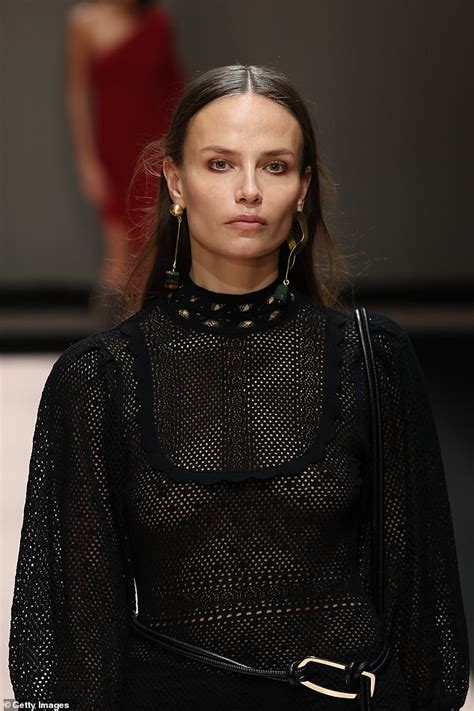 Amber Valletta Looks Every Inch The Supermodel In A Black Silk Dress As