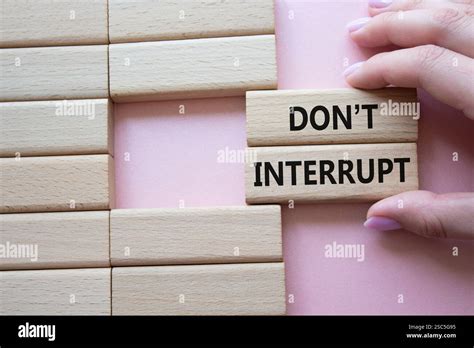 Dont Interrupt Symbol Concept Word Dont Interrupt On Wooden Blocks