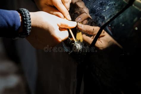 Car Break In Attempt With Focus On Hand And Lock Mechanism Stock Photo Image Of Closeup