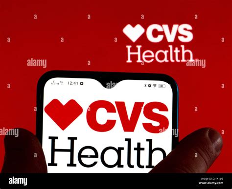 In This Photo Illustration The Cvs Health Logo Is Displayed On A