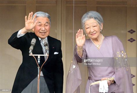 Emperor Akihito And Empress Michiko Wave To Well Wishers At The News