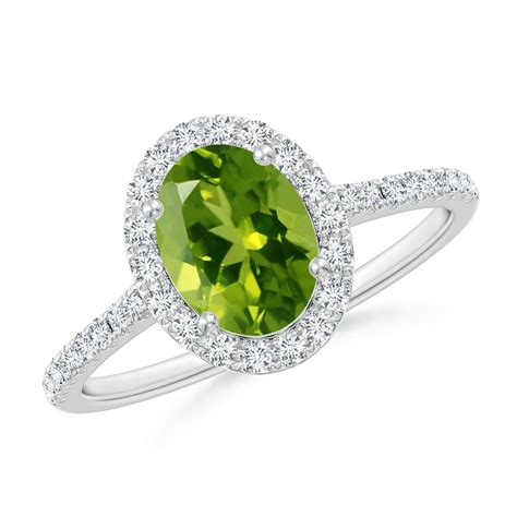 Prong Set Oval Peridot Halo Ring With Diamonds