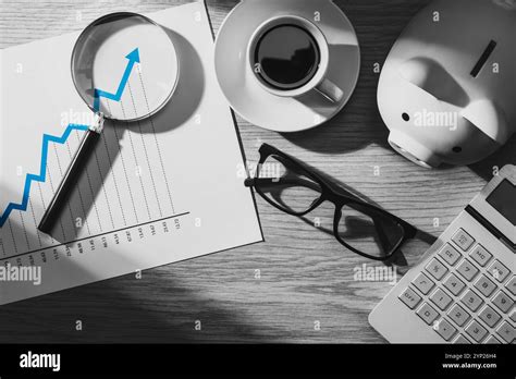 Financial Chart With Arrow Going Up Showing Positive Trend And Magnifier Data Analytics