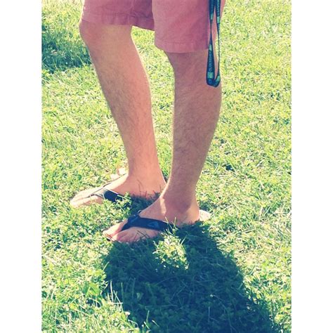 Cropping Grass You Do Not See The Entire Persons Body Just Feet