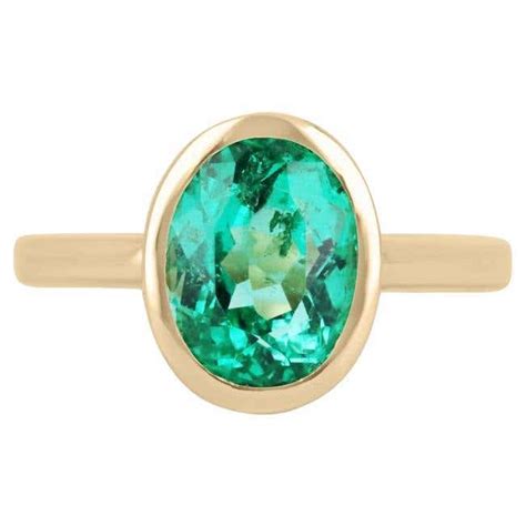 315cts 18k Bezel Set Oval Emerald Engagement Ring Yellow Gold For Sale