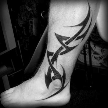26 Fascinating Tribal Leg Tattoos