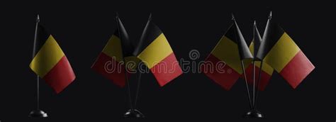 Small National Flags Of The Belgium On A Black Background Stock Image