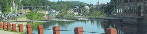 Eb Past An Old Mill Bridge Over The Black River In Springfield
