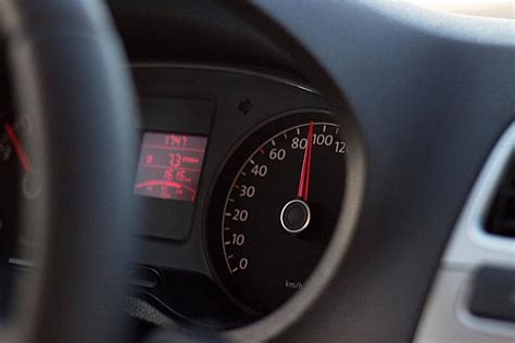 Fast Tachometer Reading On Sleek Car Dashboard Risk Measurement