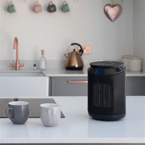 tcp smart wifi mini portable ceramic fan heater 2kw black toolstation