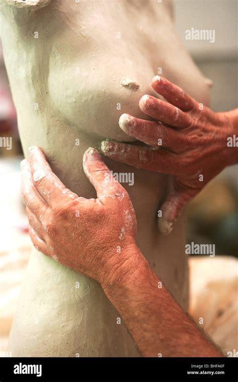 Hands Of An Artist Shaping A Clay Sculpture Of A Female Body Richard Smith Aptos California