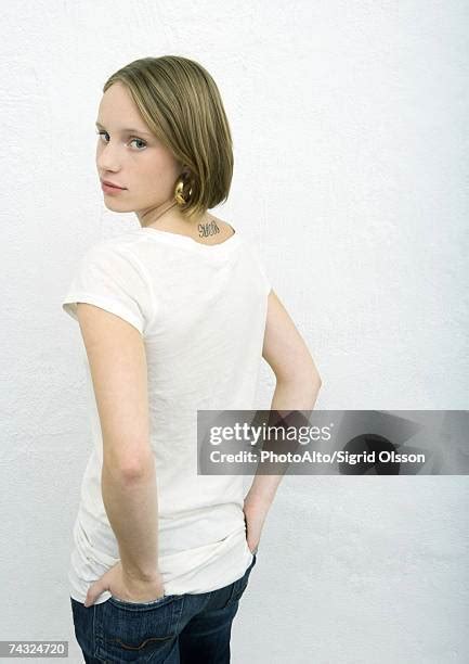 Girl Looking Back Over Shoulder Photos And Premium High Res Pictures