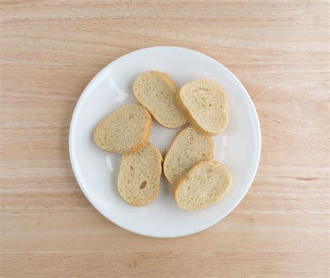 Small Slices Of French Bread On A White Plate Stock Image Image Of