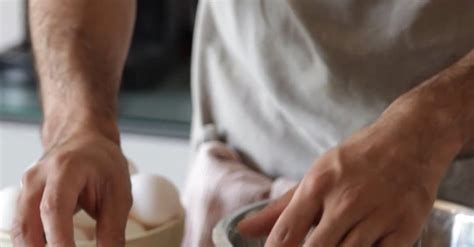 A Person Separating An Egg White And An Egg Yolk Free Stock Video