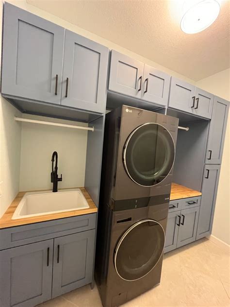 Organized Laundry Room With Butcher Block Counter