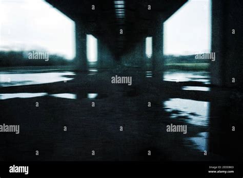 A Moody Dream Like Concept Under A Road Bridge In A Post Industrial