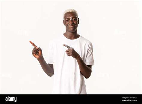 Portrait Of Young African American Blond Guy With Smug Face Smirking