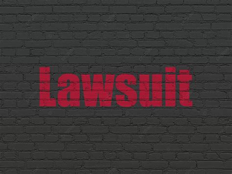Law Concept Lawsuit On Wall Background Business Patent Jurisprudence