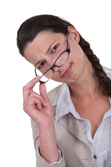 Woman Peering Over Her Glasses Scrunch Braid Peering Perplexed Peer
