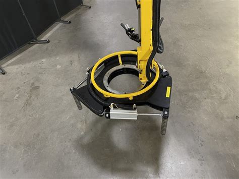 Industrial Manipulator With A Custom Tire Handler Gci